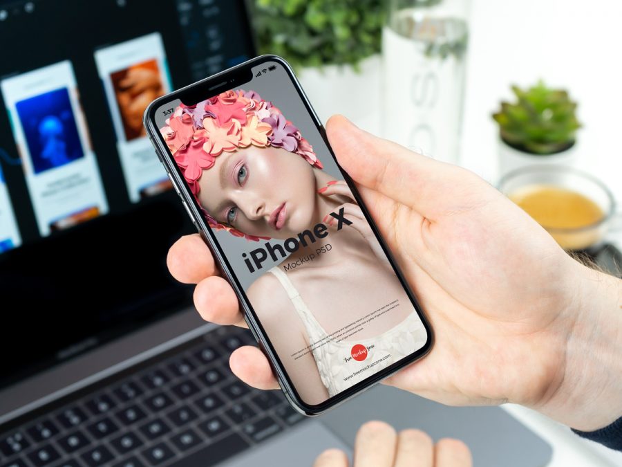 Free Man Holding in Hand iPhone X Mockup PSD - Free Mockup Zone