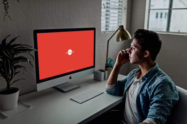Free Developer Using iMac Mockup - Free Mockup Zone