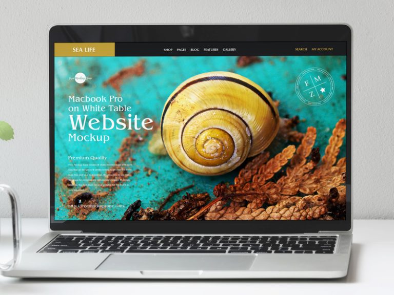 Free MacBook Pro on White Table Website Mockup - Free Mockup Zone