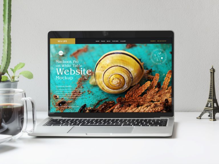 Free MacBook Pro on White Table Website Mockup - Free Mockup Zone